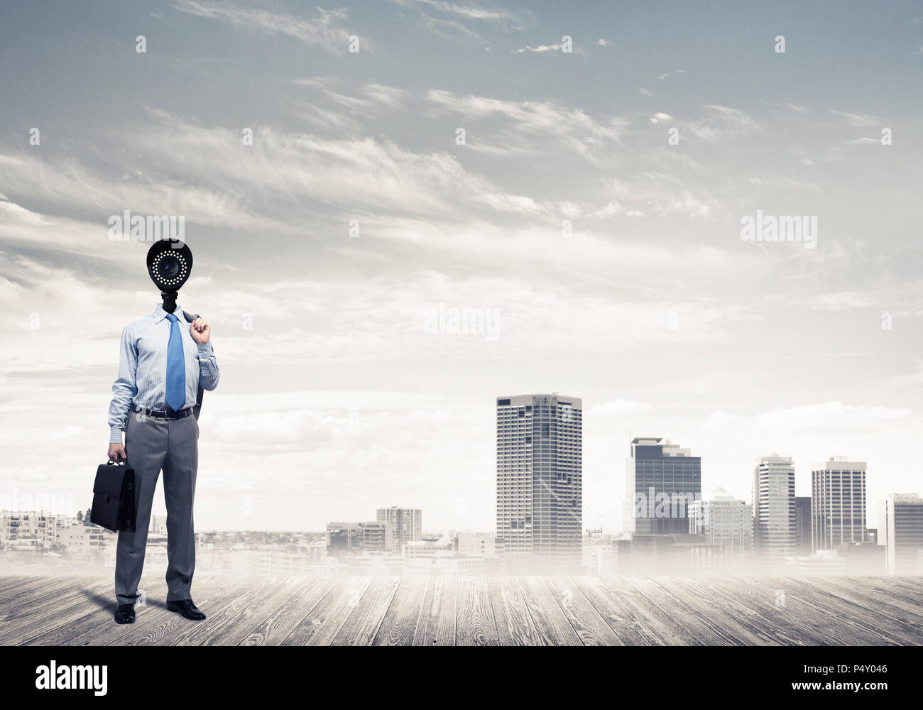 Camera headed man standing on wooden floor against modern citysc Stock ...