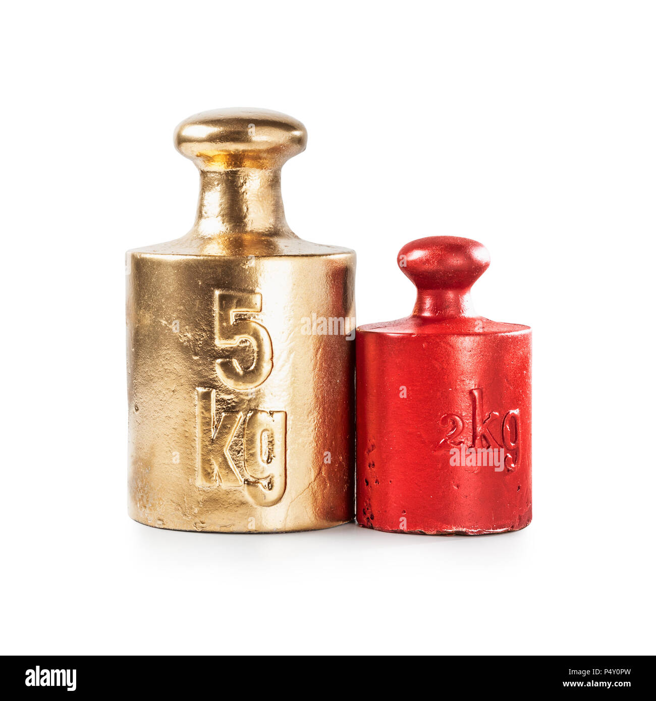 Old weights gold and red colored isolated on white background clipping ...