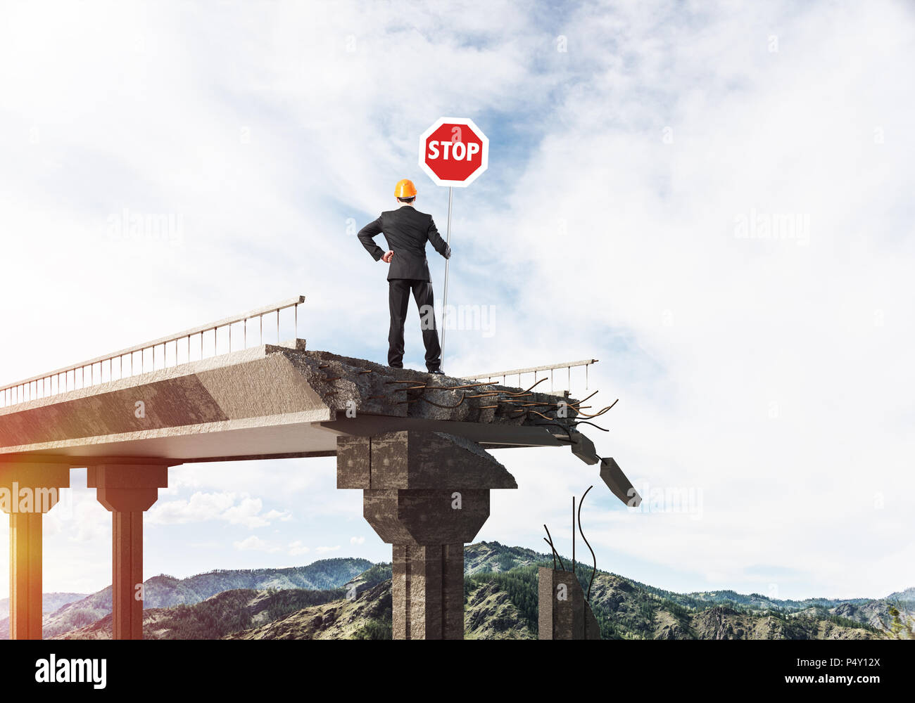 Confident engineer holding street safety sign Stock Photo - Alamy