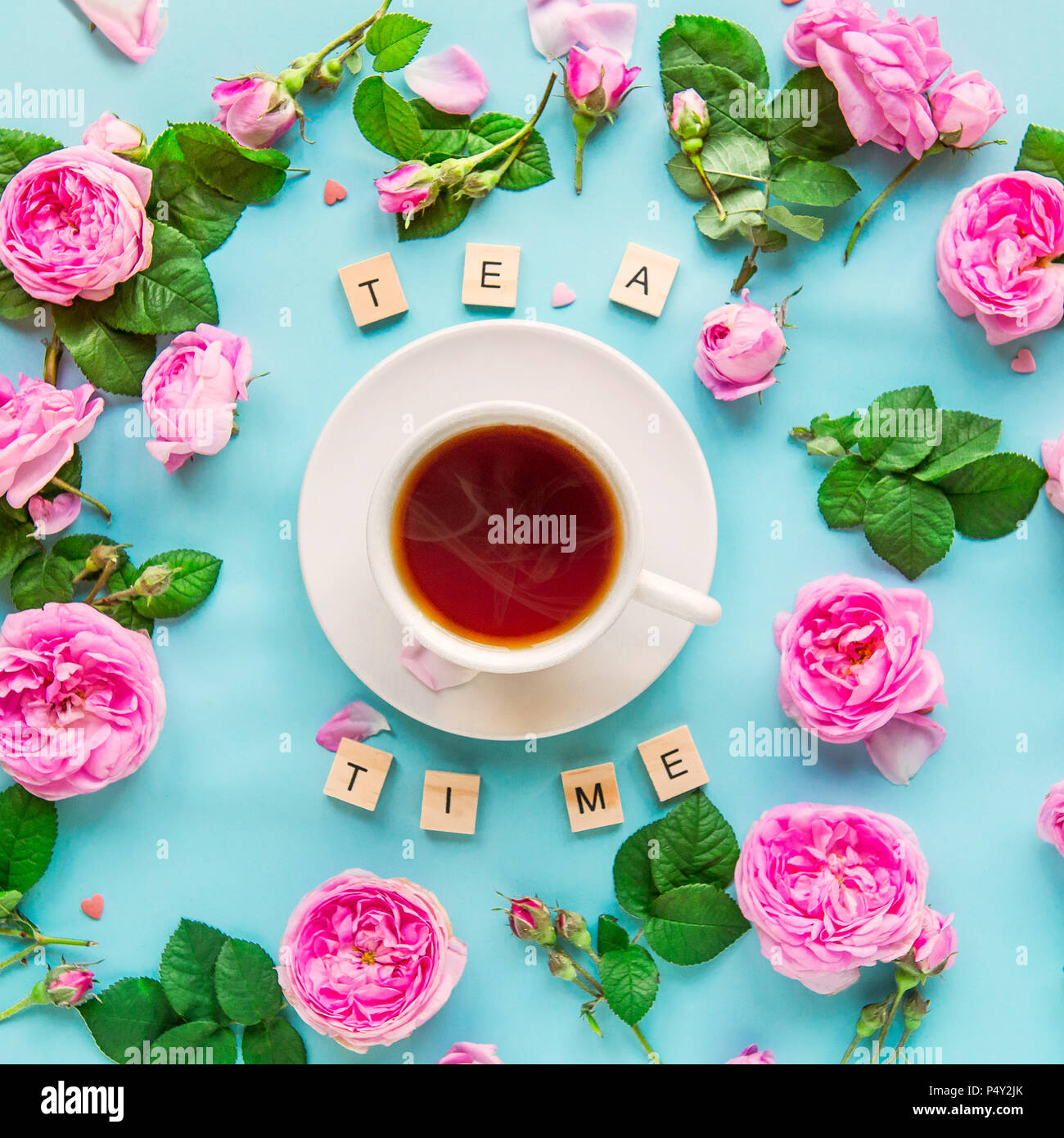 Top view creative layout with Tea time lettering with wooden blocks ...