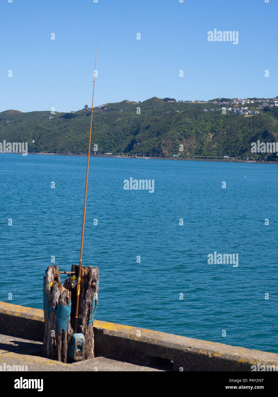 Fishing Off Petone Wharf Stock Photo - Alamy