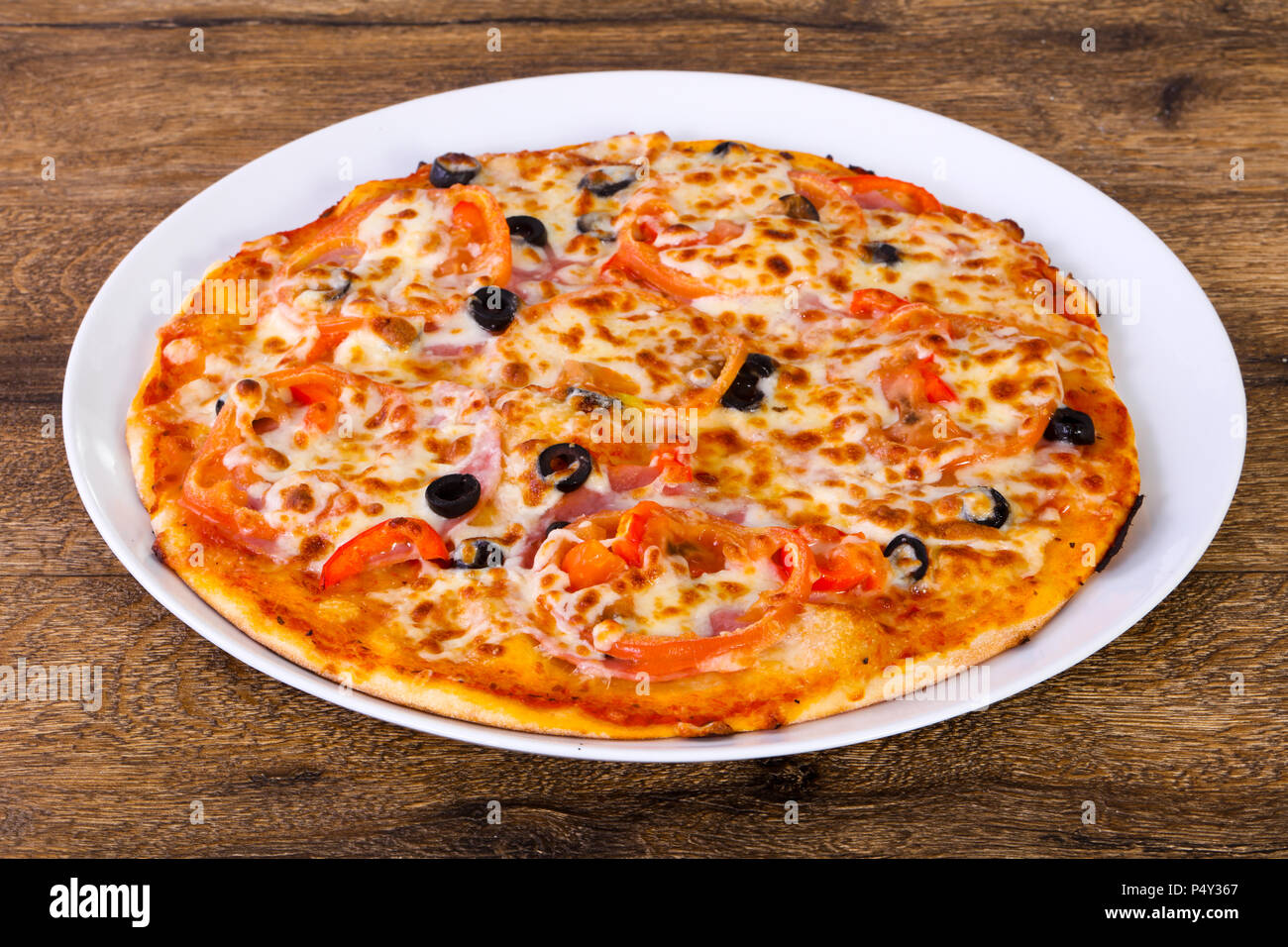 Pizza with ham and cheese Stock Photo - Alamy
