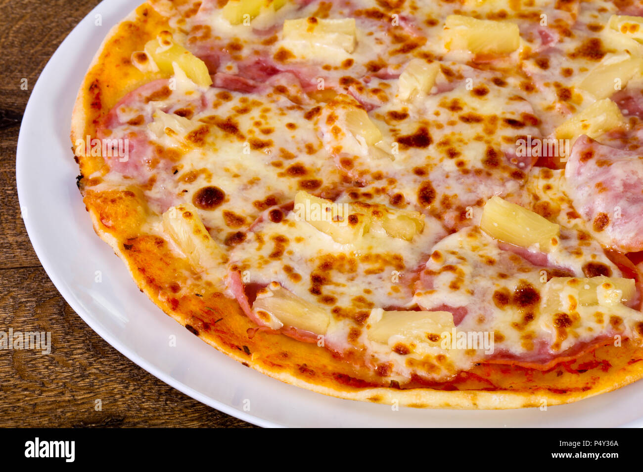 Pizza with ham and cheese Stock Photo - Alamy