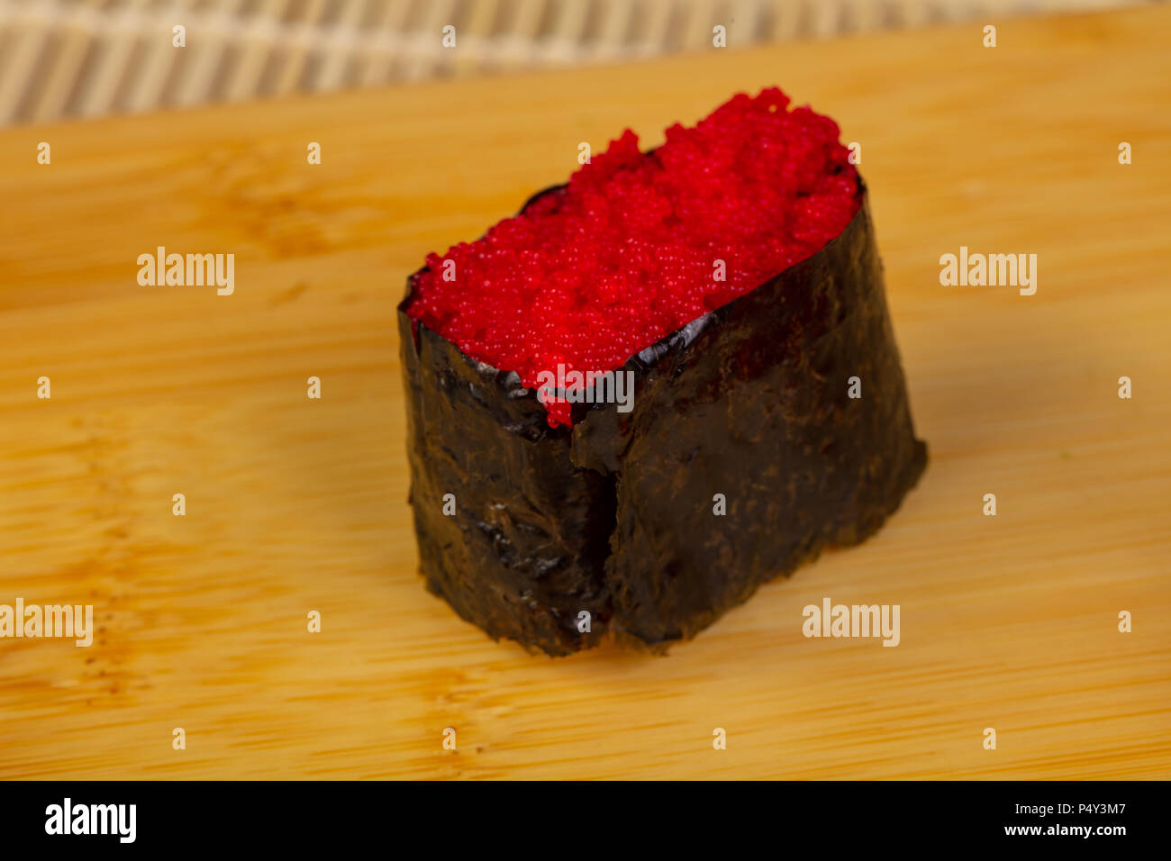 Delicious red masago sushi with caviar Stock Photo - Alamy