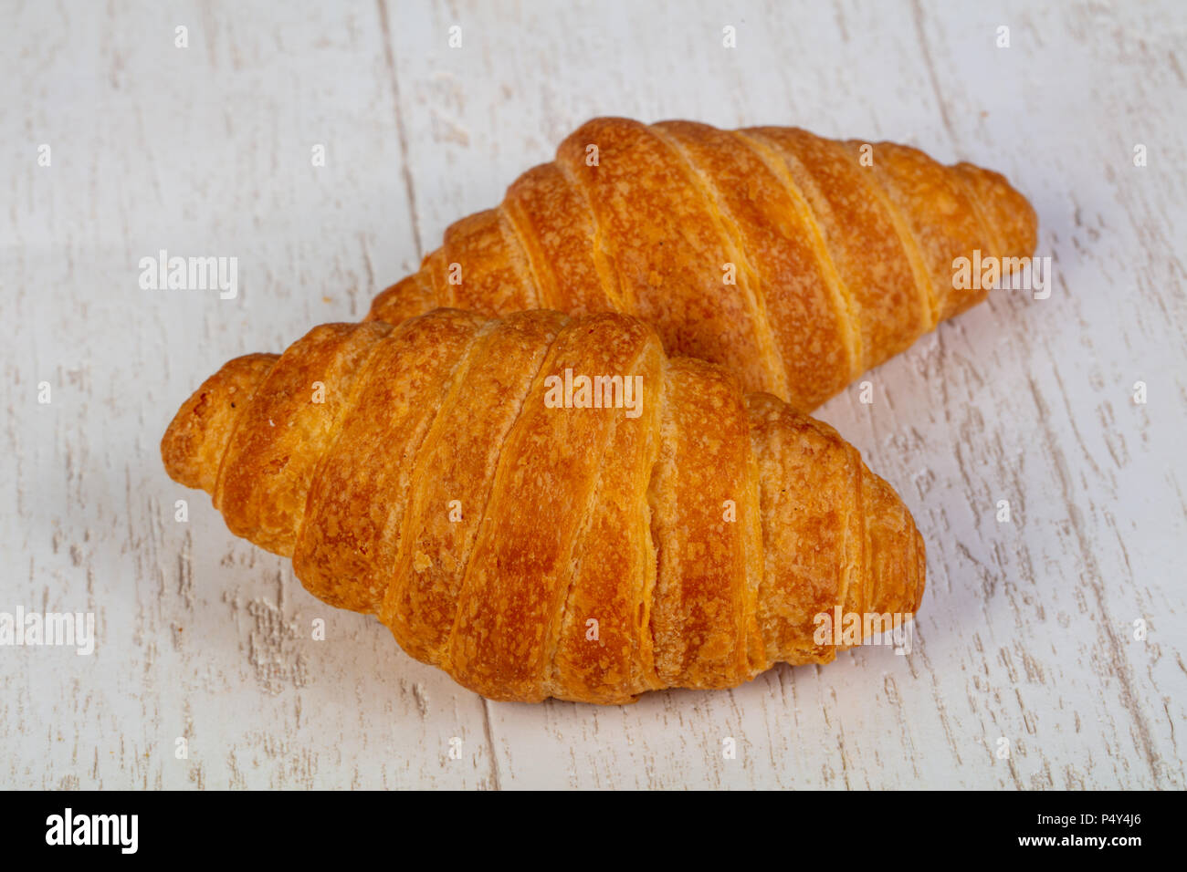 Delicious traditional baked french croissant Stock Photo - Alamy
