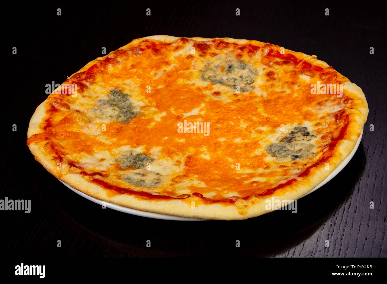 Delicious italian 4 cheese pizza Stock Photo - Alamy