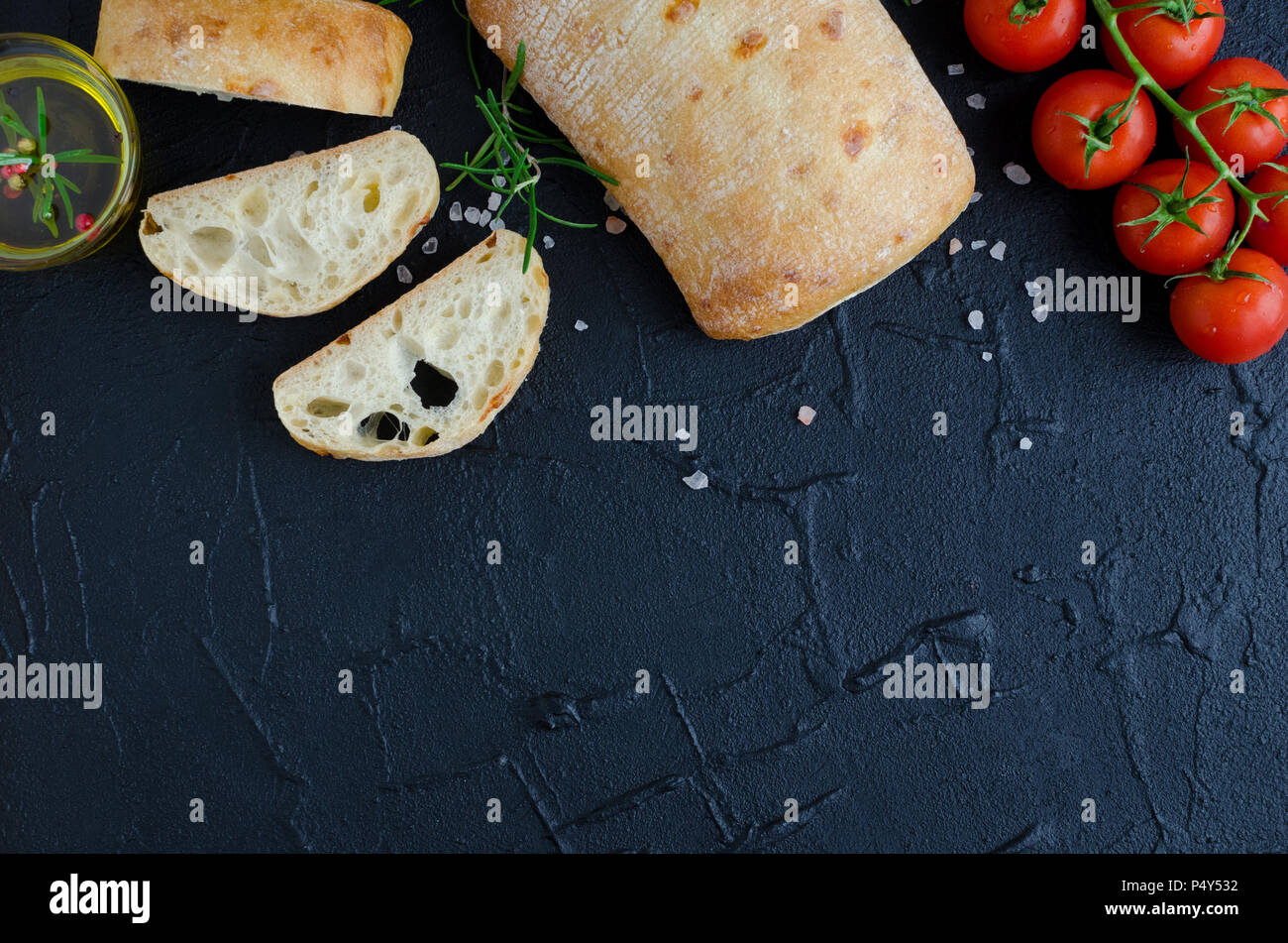 Sliced freshly baked loaf of traditional italian bread ciabatta on ...