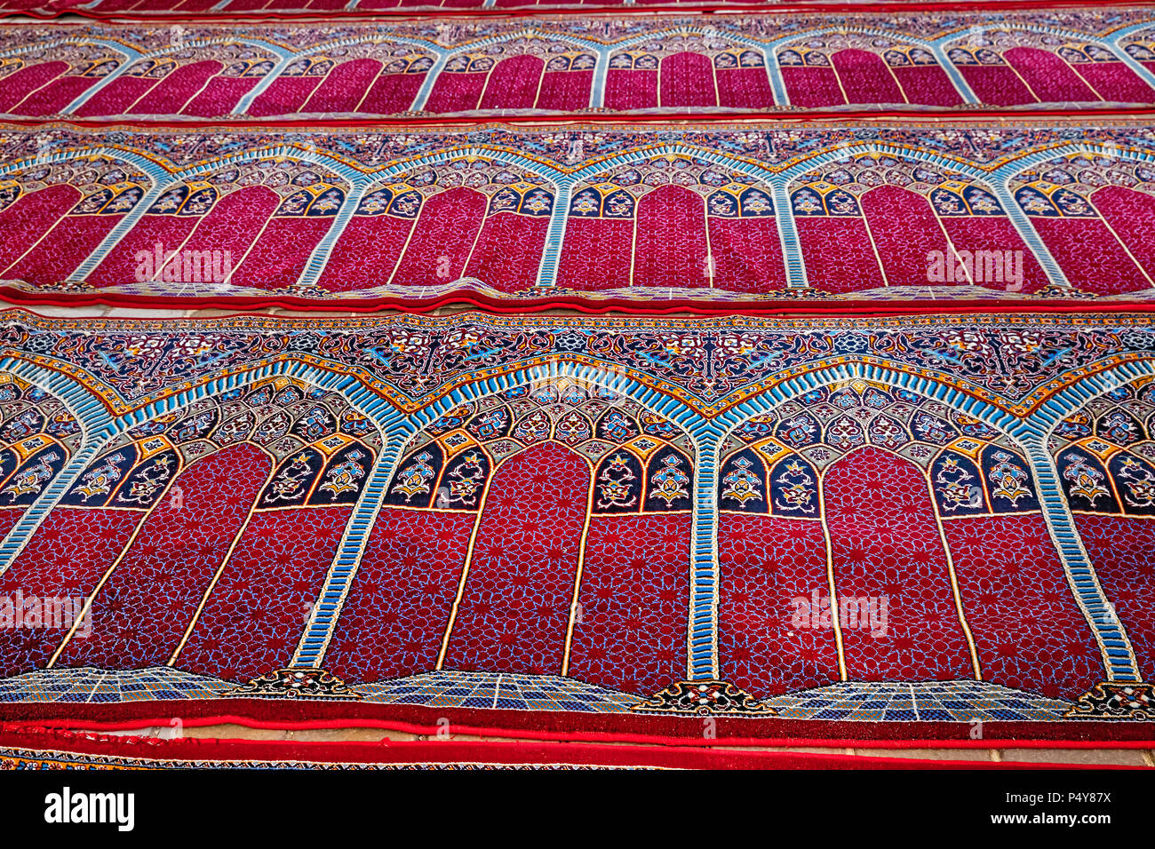 Mosque prayer carpets Stock Photo - Alamy