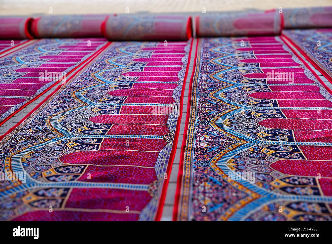 Mosque prayer carpets Stock Photo - Alamy
