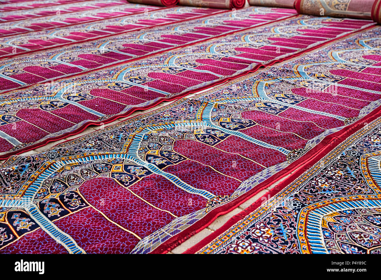 Mosque prayer carpets Stock Photo - Alamy