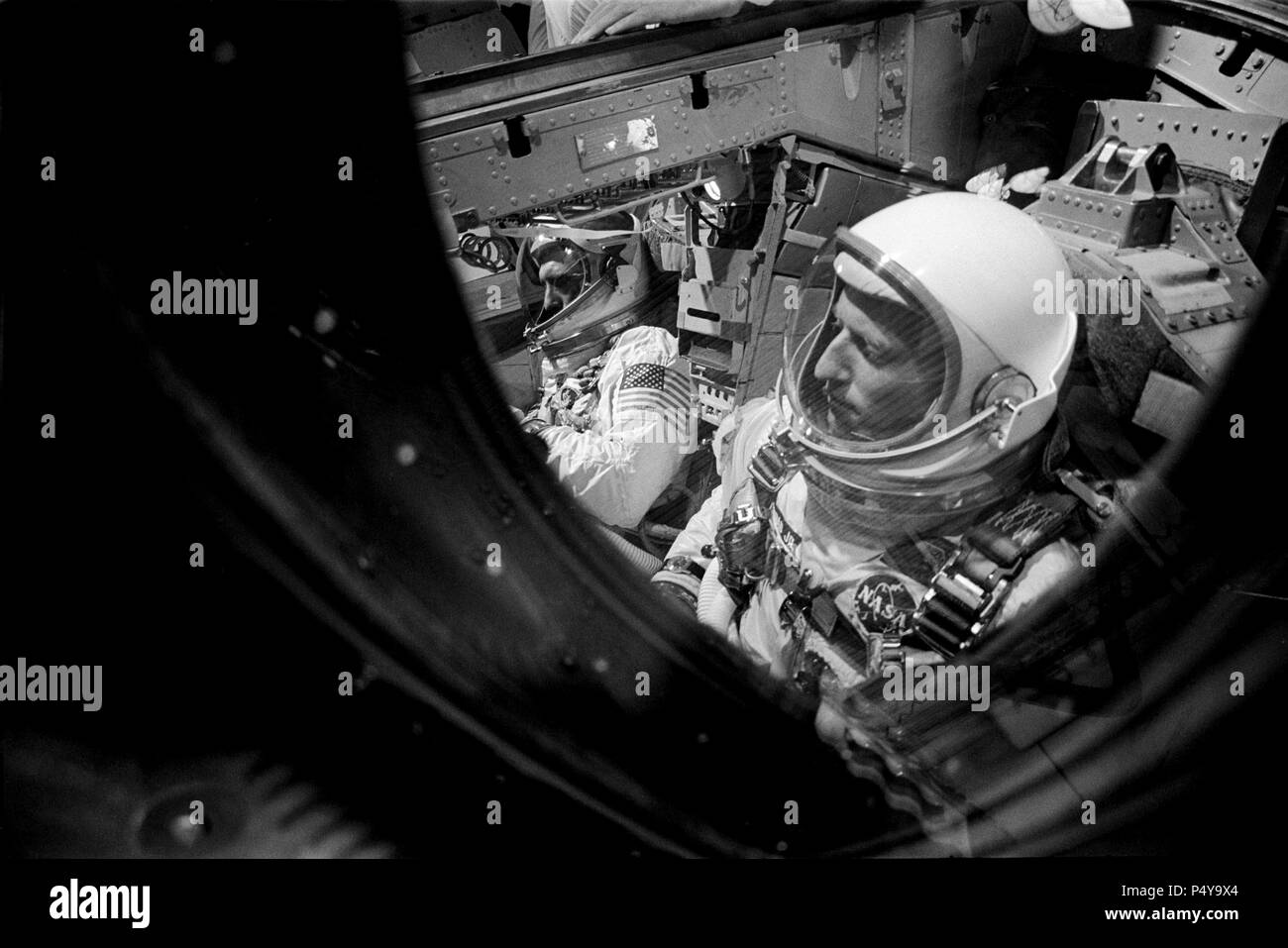 Astronauts Charles Conrad Jr. (foreground), command pilot, and Richard F. Gordon Jr., pilot, are ...