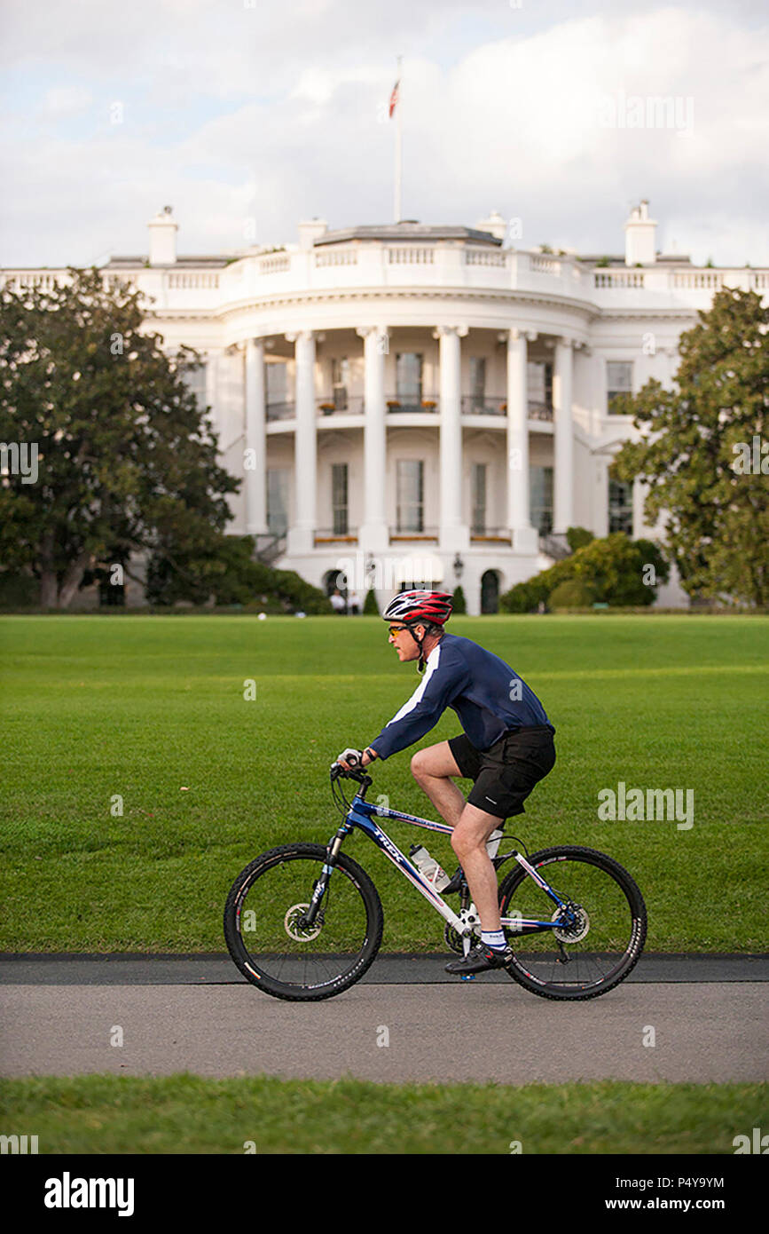 President George W. Bush rides a bike Nov. 1, 2006, on the South Lawn ...
