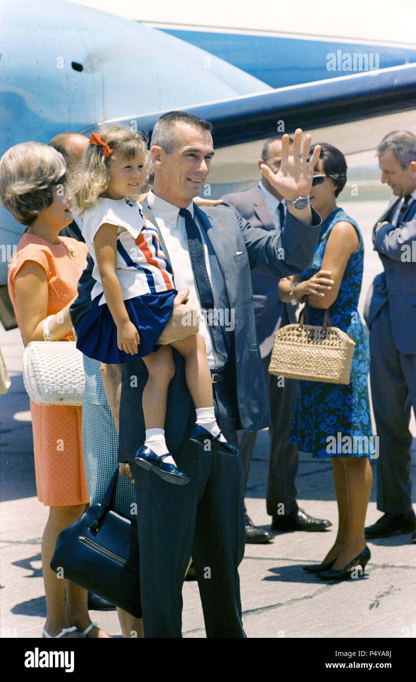 Astronauts Eugene A. Cernan (holding daughter, Tracy) and Thomas P ...