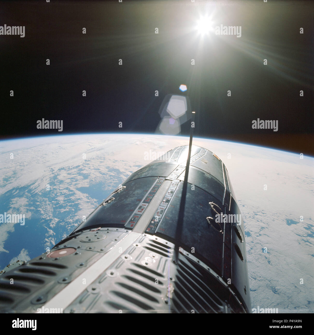 Backdropped over the Pacific Ocean, the nose of the Gemini spacecraft ...