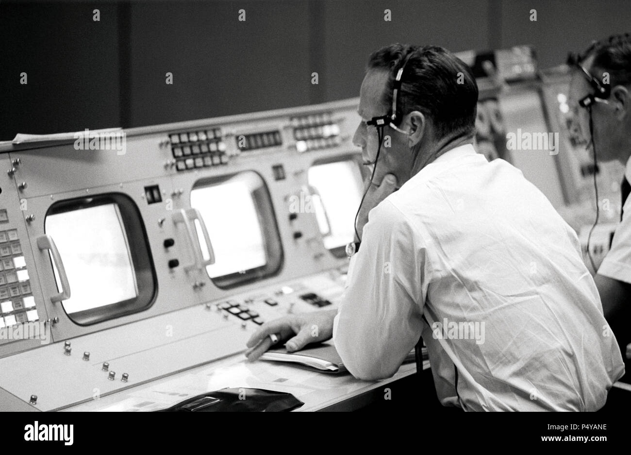 Astronaut M. Scott Carpenter monitors the Booster Systems Console in ...