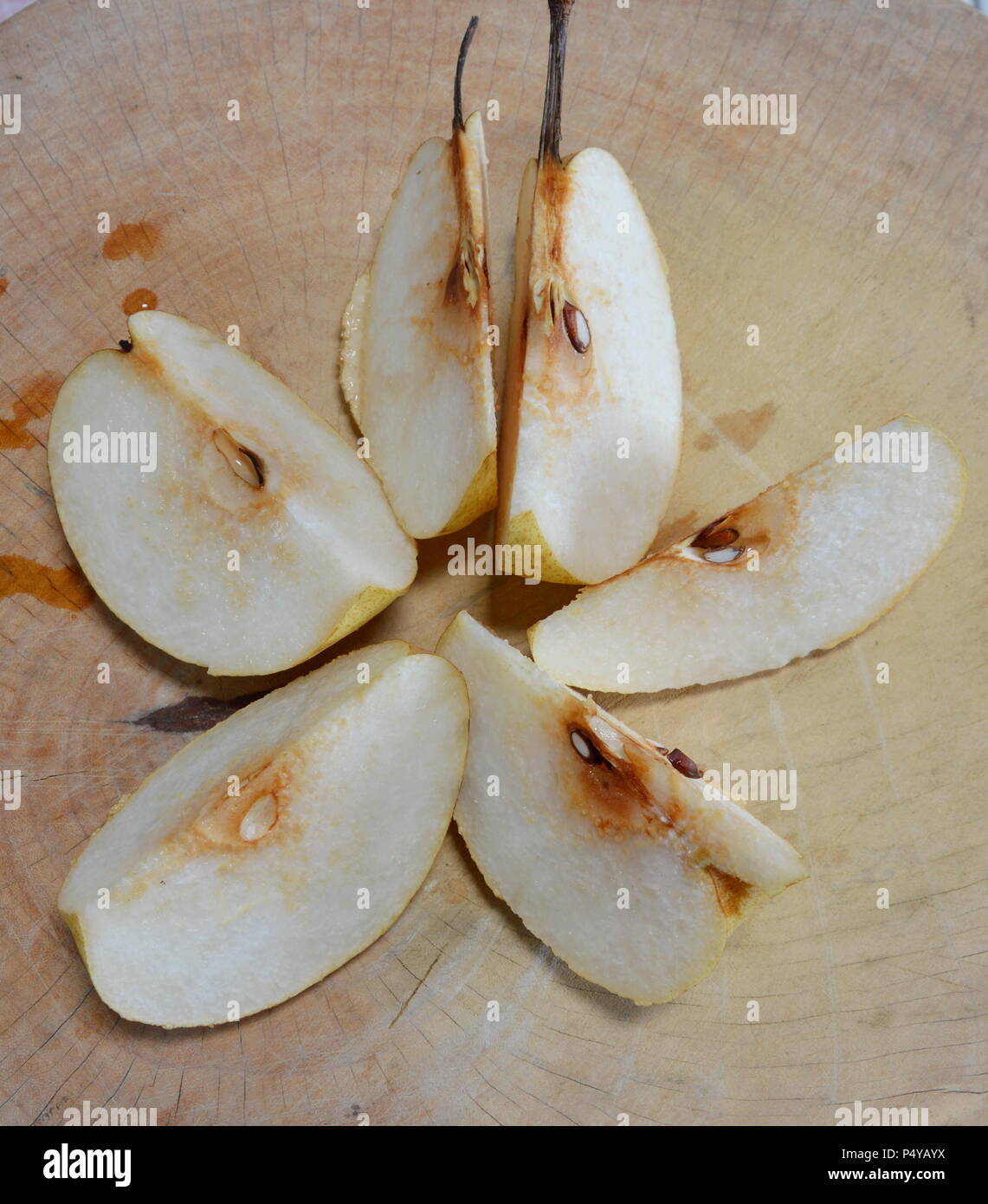 apple cutting on wooden chop block Stock Photo - Alamy