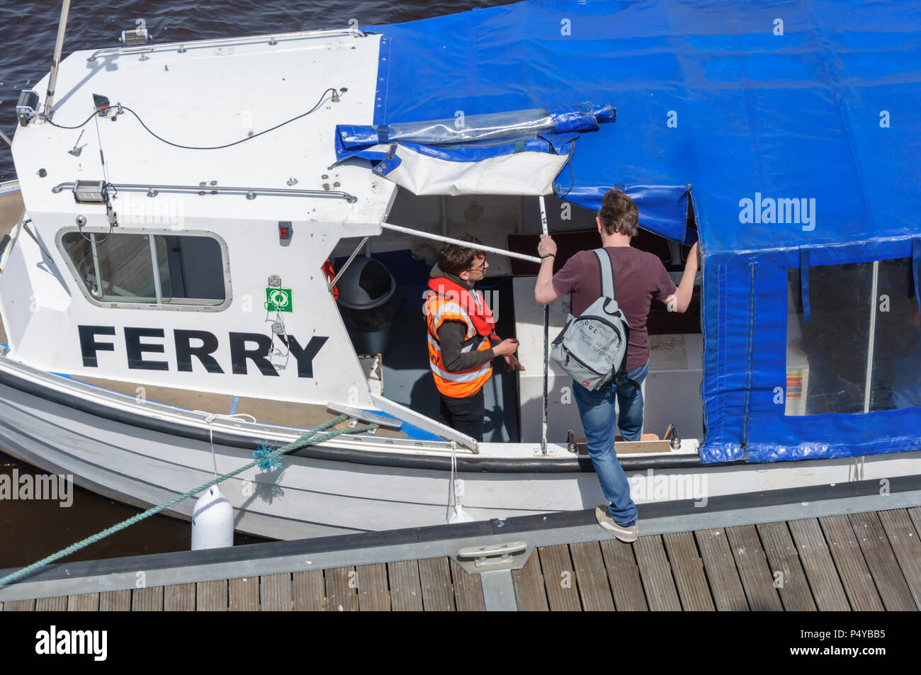 Glasgow, Scotland, UK. 23rd June, 2018. UK Weather.A passenger steps ...