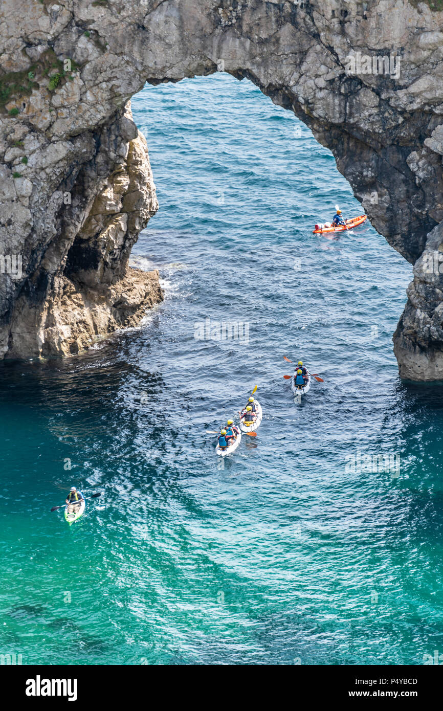 Lulworth, Dorset, UK. 23rd June 2018. Kayaking through Durdle Door on ...