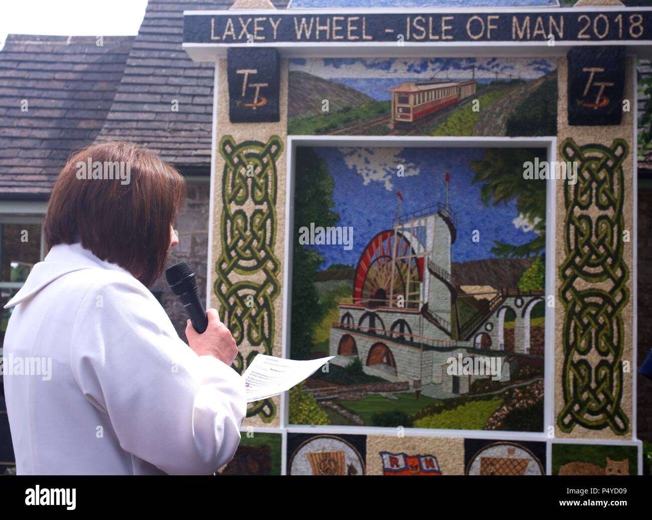 Tideswell. Derbyshire. 23rd June 2018.A clergywoman reads the Blessing ...