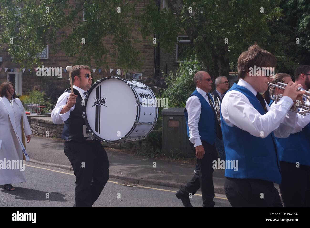 Tideswell. Derbyshire. 23rd. JUne. 2018 The Tideswell Band leads the ...