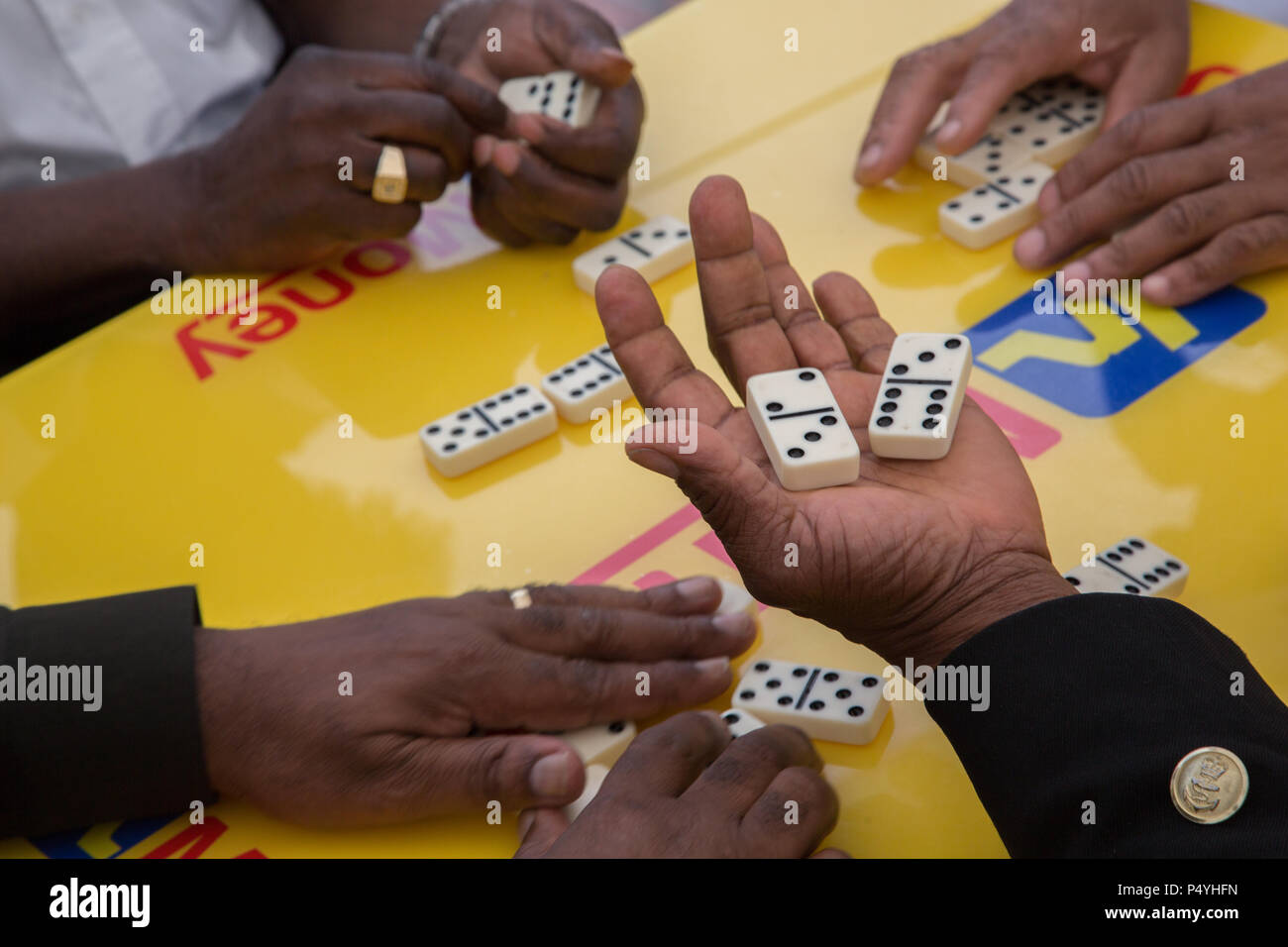 London UK 23rd June 2018 People play Dominoes in windrush square on ...