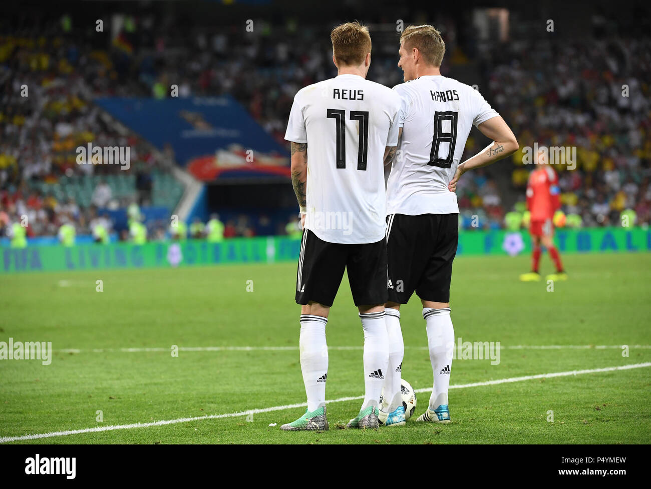 Marco Reus (Germany) speaks with Toni Kroos (Germany)/r. shortly before ...