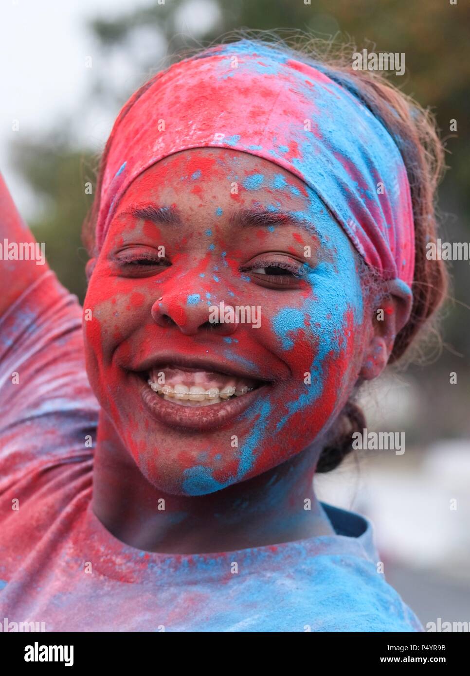 Los Angles, USA. 23rd June, 2018. A runner with color powder on her ...