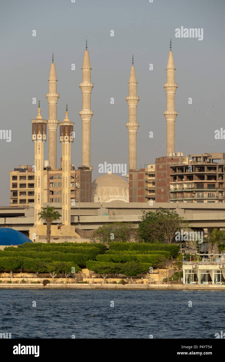 view of the Nile and minarets of mosques and housing at Shobra, Cairo ...