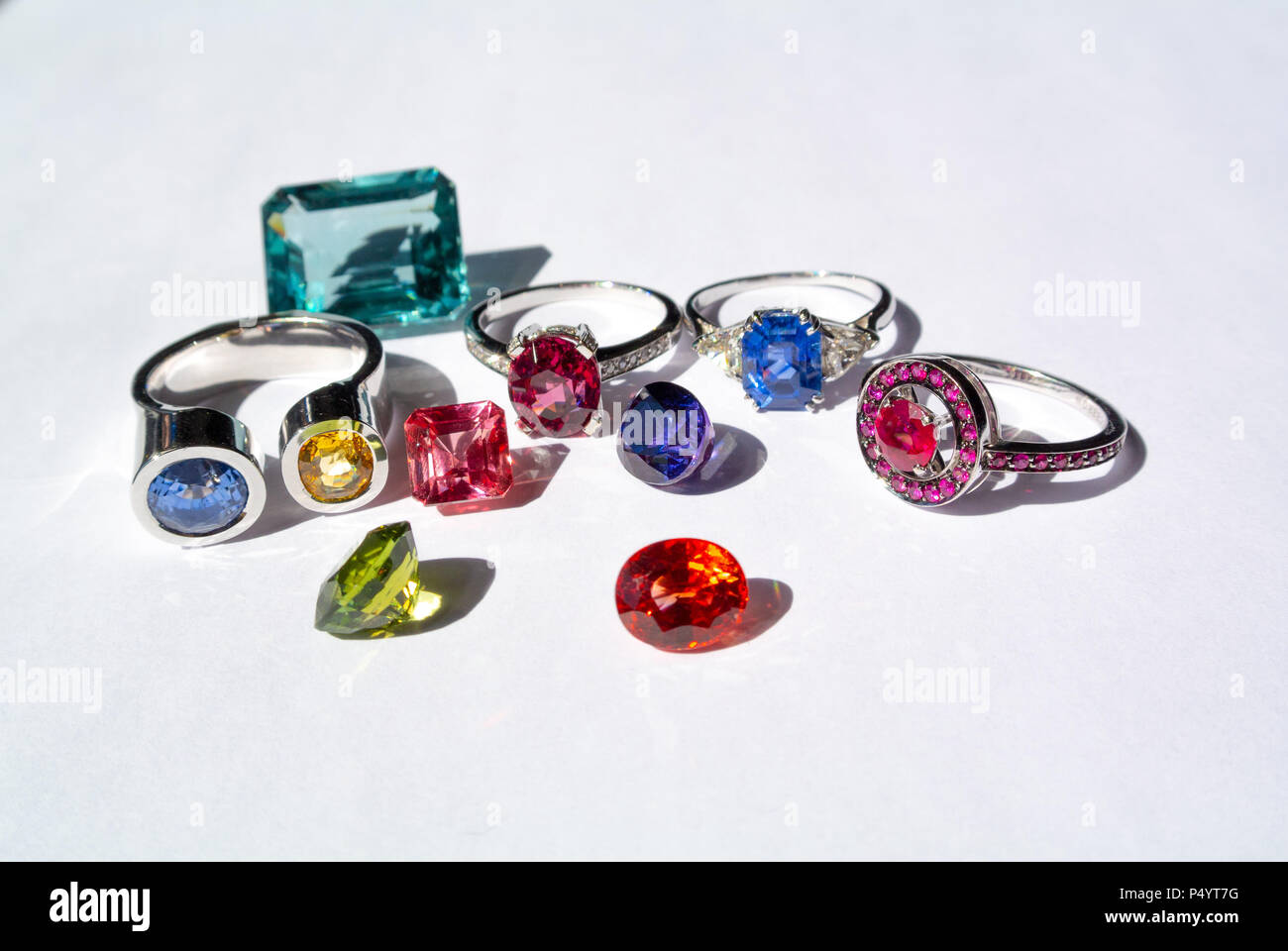 multicolor gems with rings with white background Stock Photo - Alamy