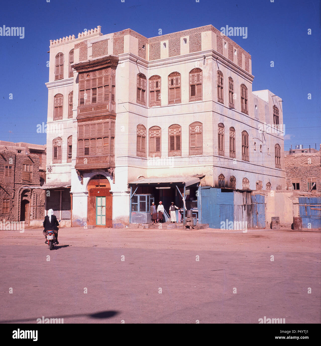 Late 1950s, historical, exterior view of an old arab building and dusty ...