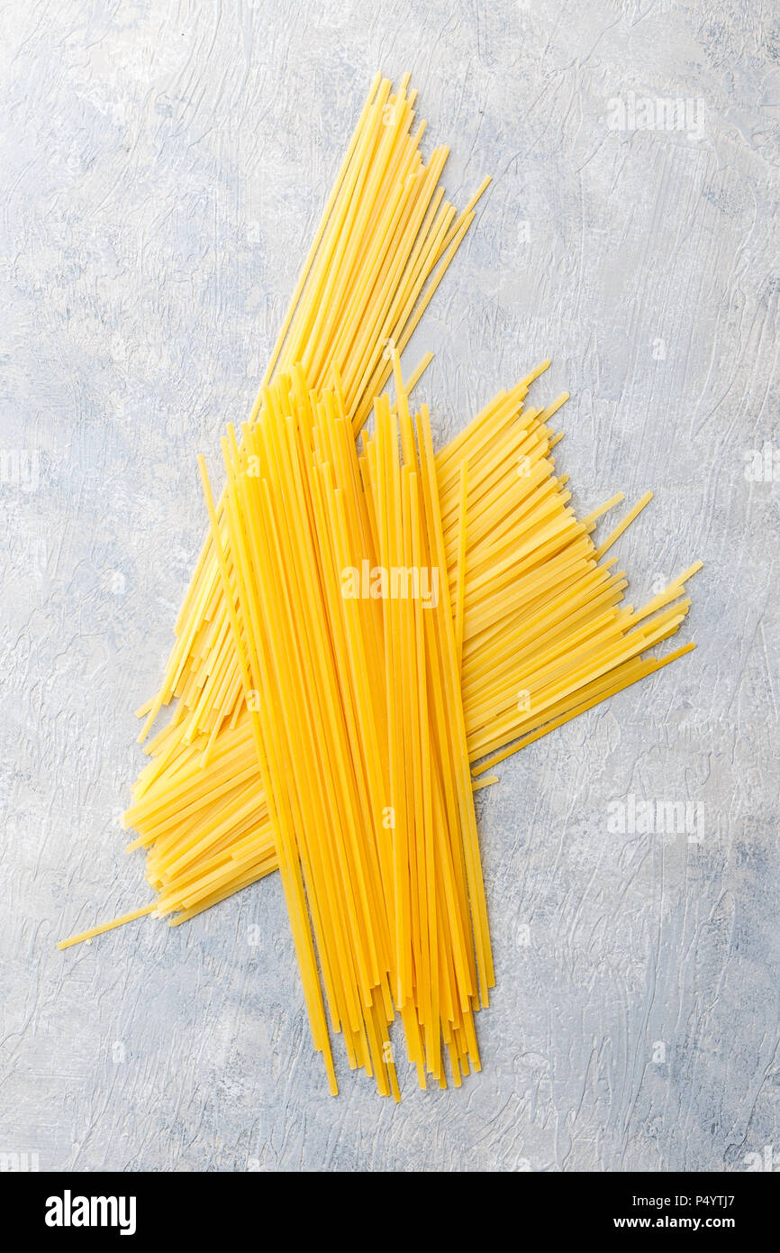 Variety of types and shapes of dry Italian pasta - Spaghetti, Linguine ...