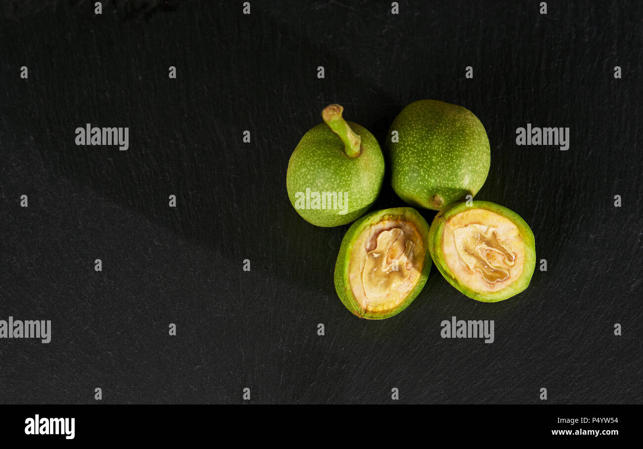 Nuts on black hi-res stock photography and images - Alamy