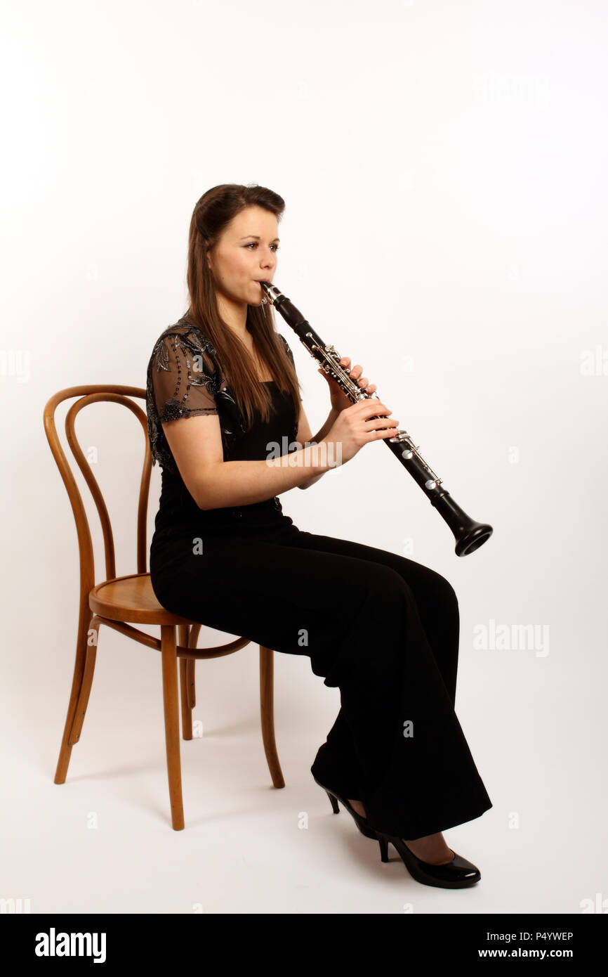 Clarinetist holding a B flat clarinet in playing position Stock Photo ...