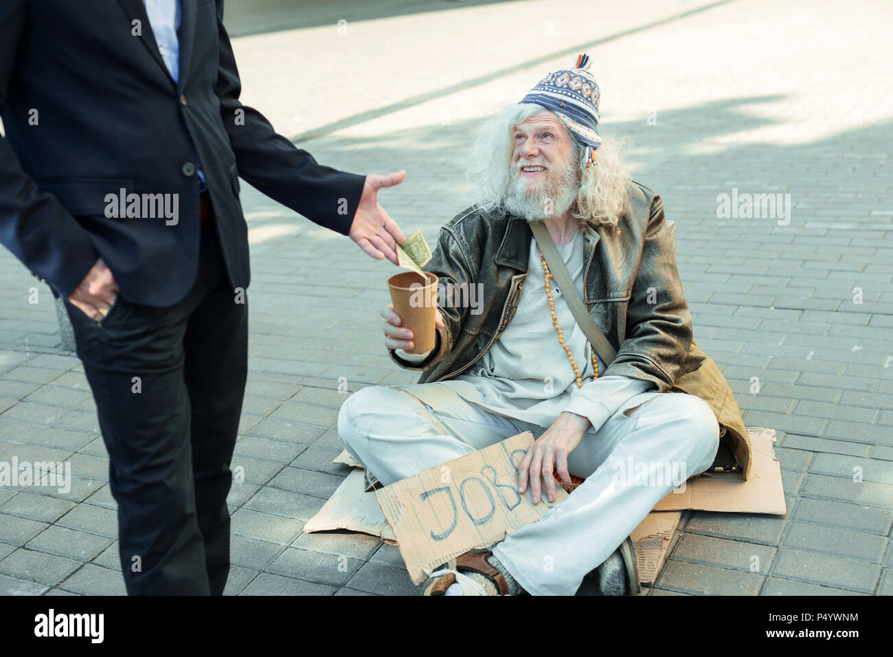 Smiling homeless man hi-res stock photography and images - Alamy