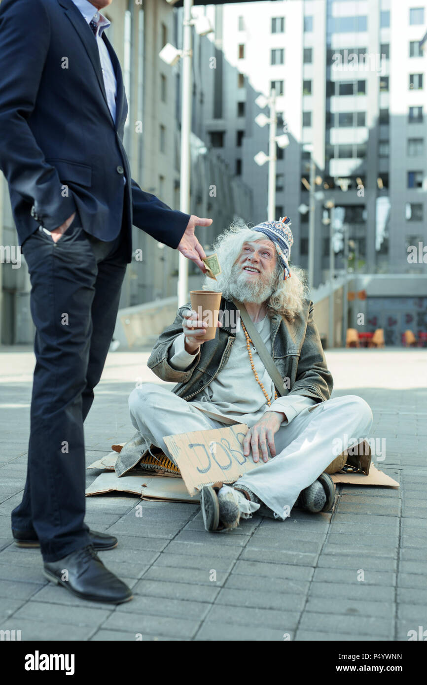 Homeless man asking for work hi-res stock photography and images - Alamy