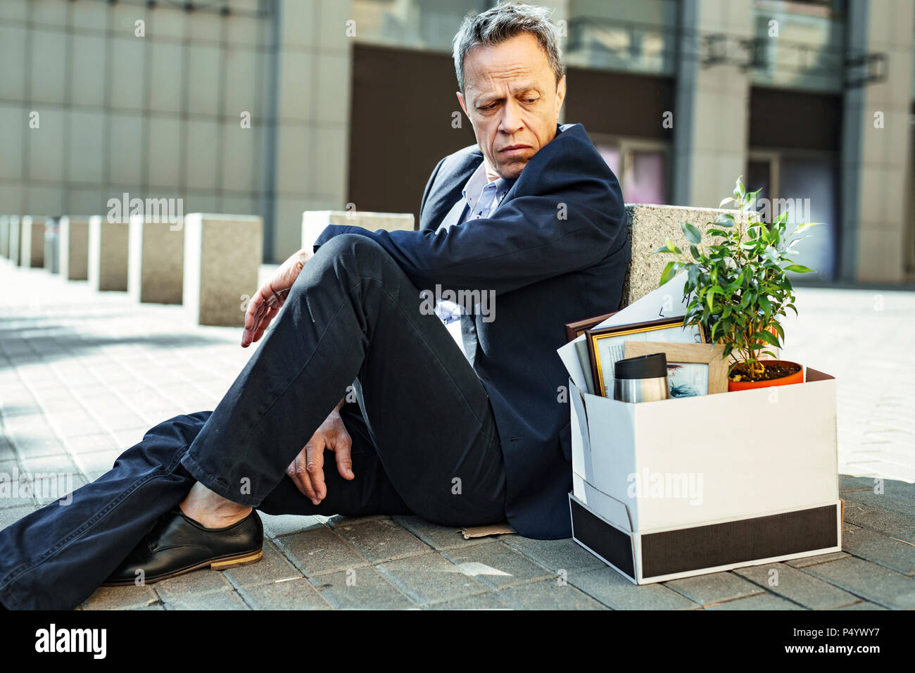 Experienced technical engineer feeling sad after being sacked Stock ...