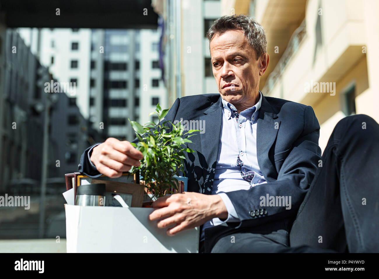 Elderly man feeling sorrowful after being discharged from project Stock ...