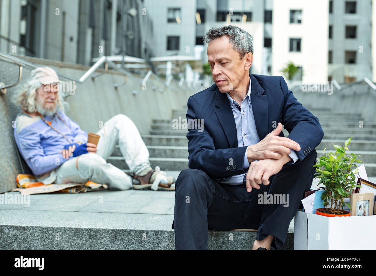 Retired technical engineer sitting outside Stock Photo - Alamy