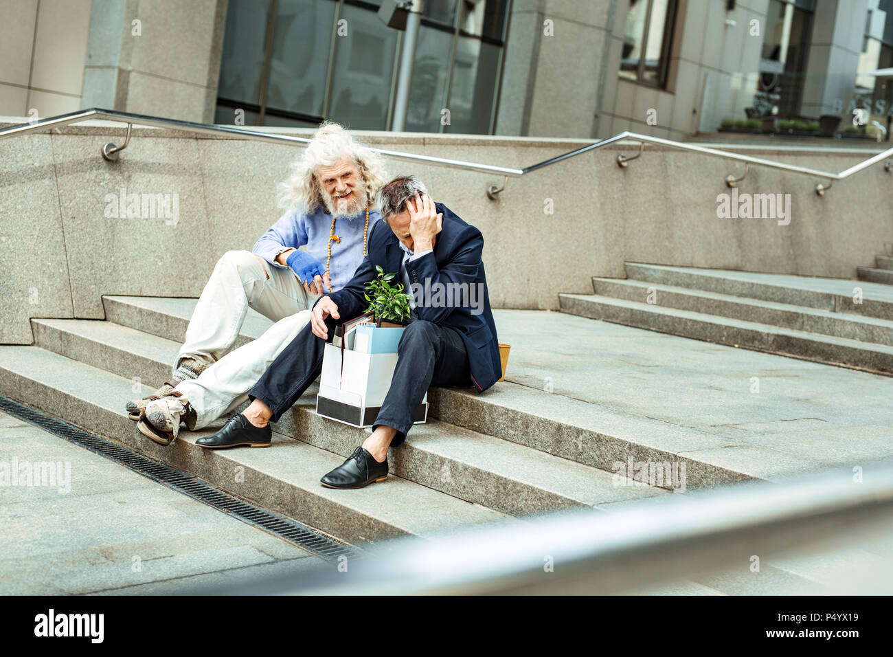 Man coming down stairs hi-res stock photography and images - Alamy