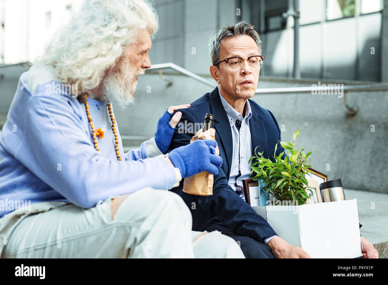 Two old friends drinking beer together Stock Photo - Alamy