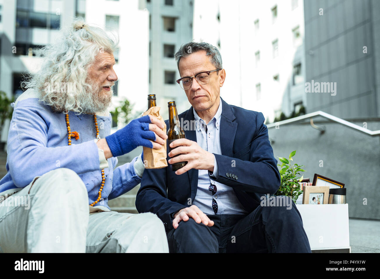 Heartbroken fired man feeling very disappointed Stock Photo - Alamy