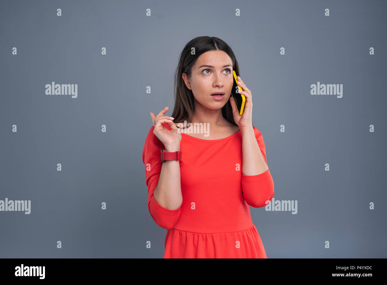 Gorgeous young woman making order via phone Stock Photo - Alamy
