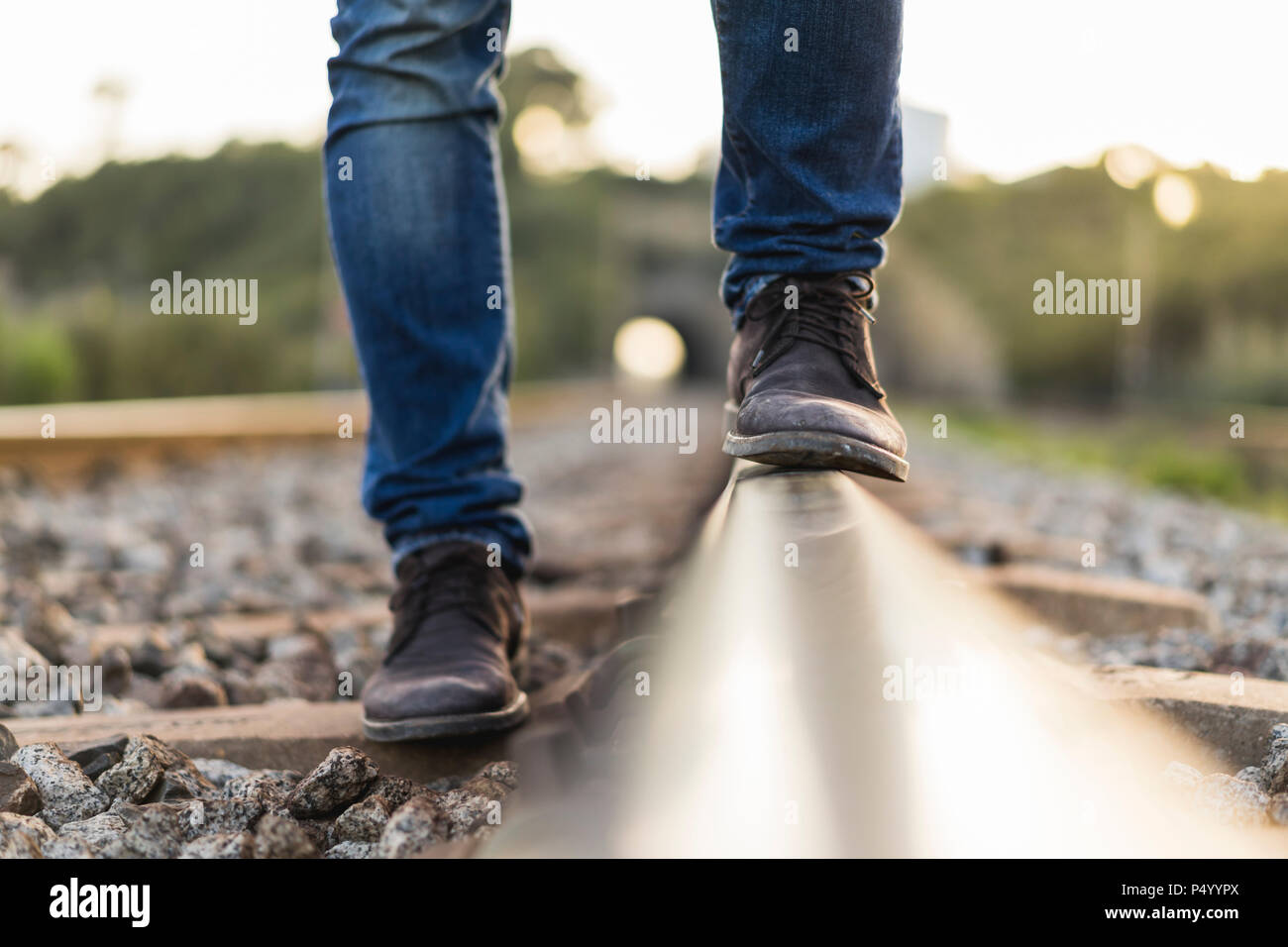 Man walking on rail track hi-res stock photography and images - Alamy