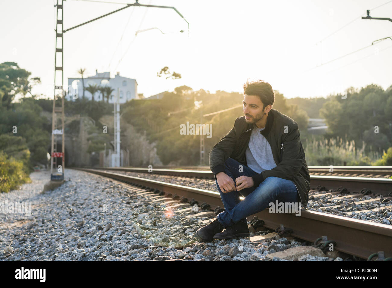 Man at side of train track hi-res stock photography and images - Alamy