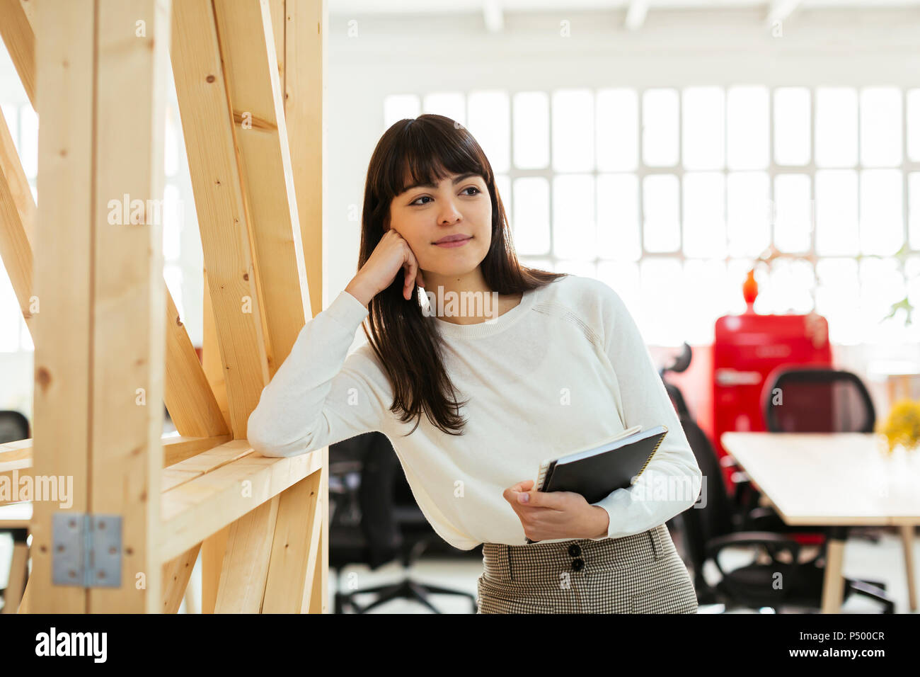 Woman and notebook hi-res stock photography and images - Alamy