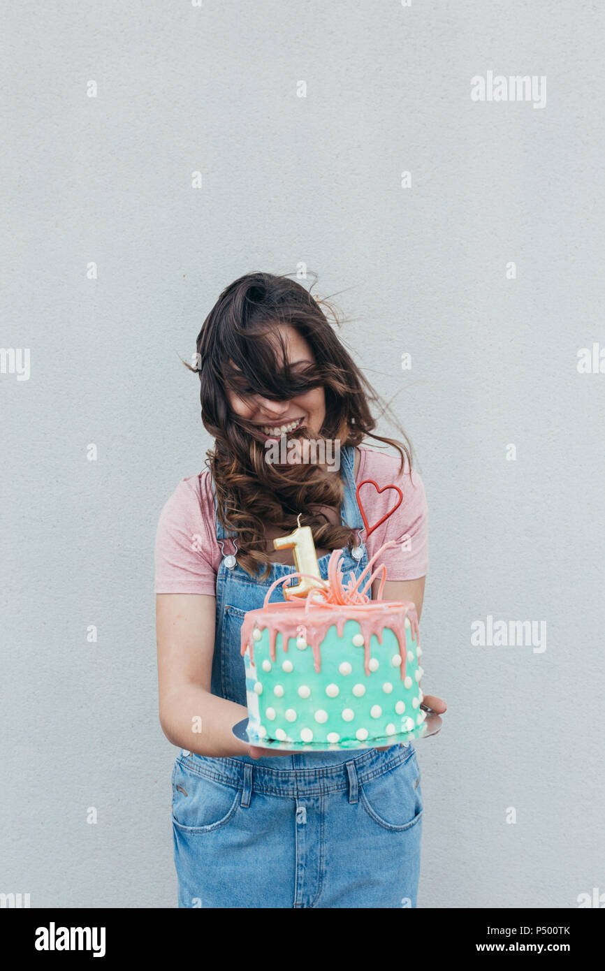 Laughing woman with Birthday cake Stock Photo - Alamy