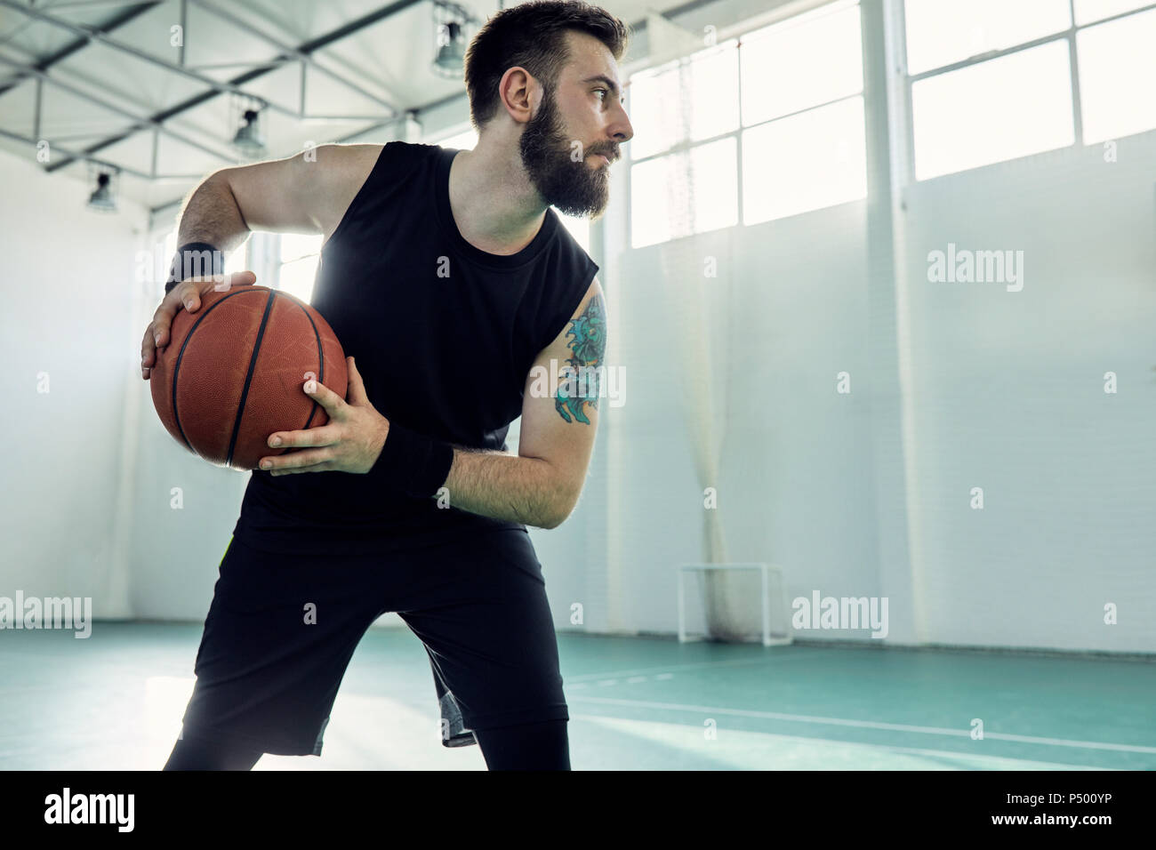 Men hold basketball sport hi-res stock photography and images - Alamy