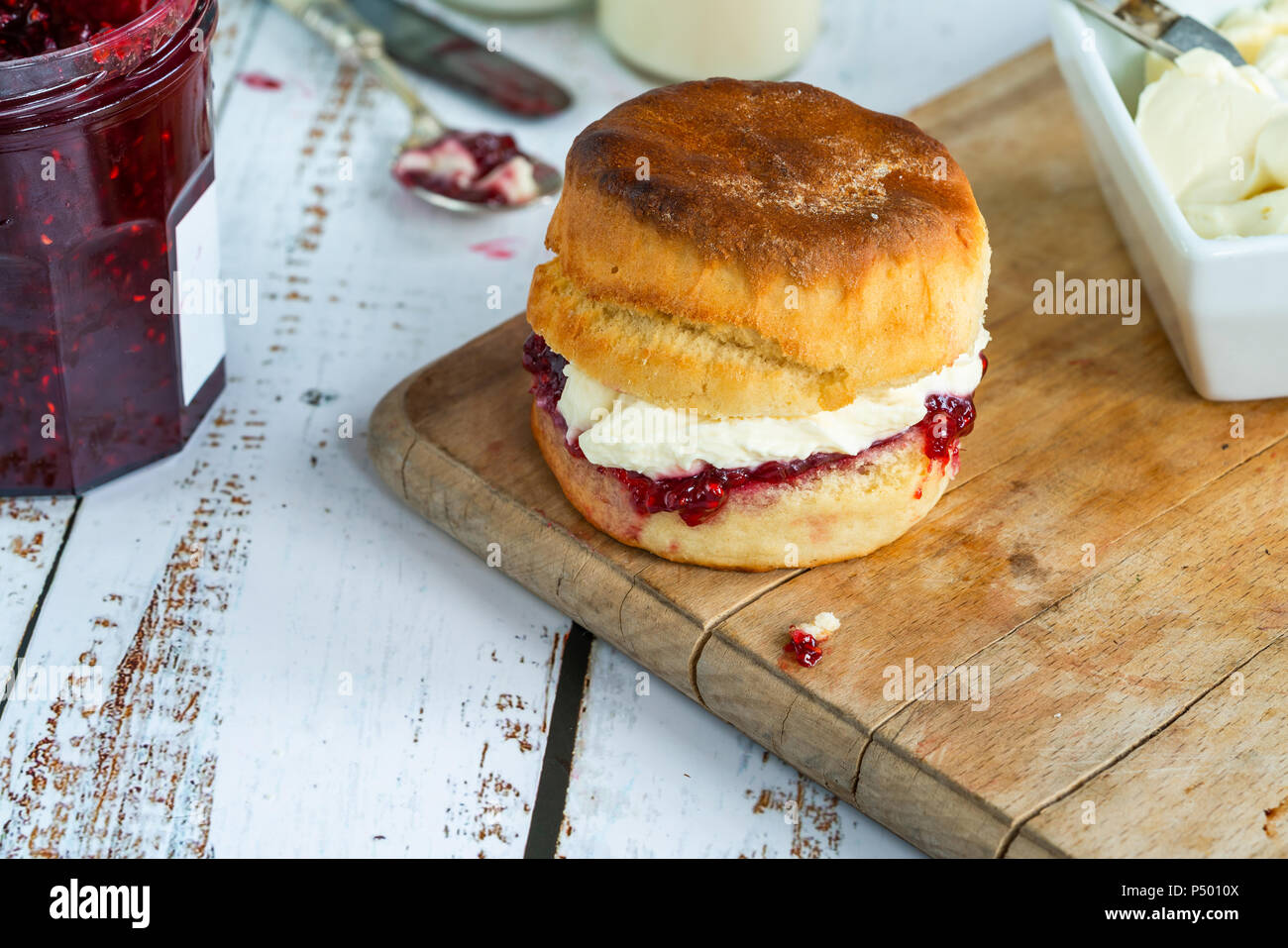 Traditional English scones with strawberry jam and clotted cream Stock ...