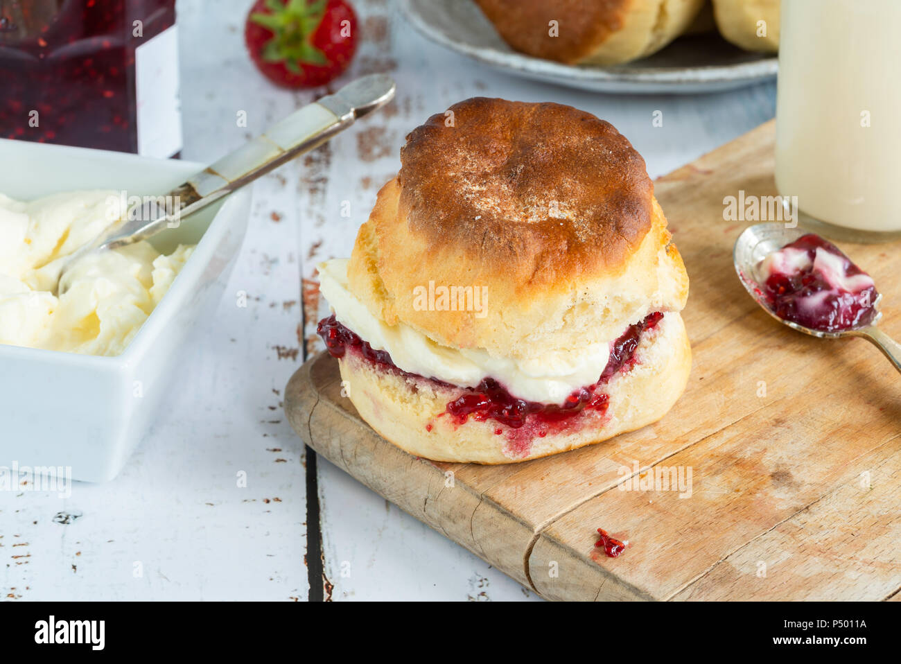 Traditional English scones with strawberry jam and clotted cream Stock ...