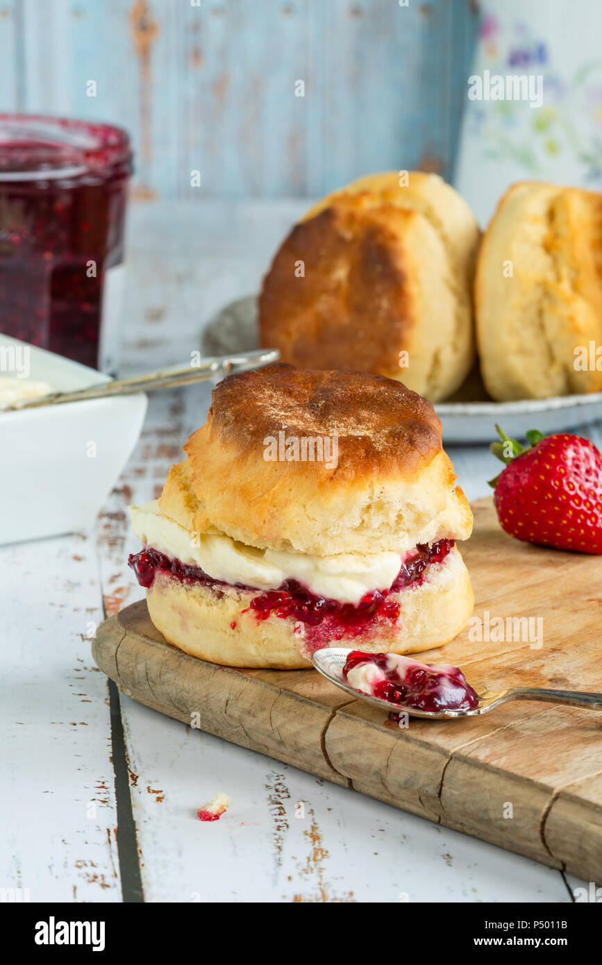 Traditional English scones with strawberry jam and clotted cream Stock ...